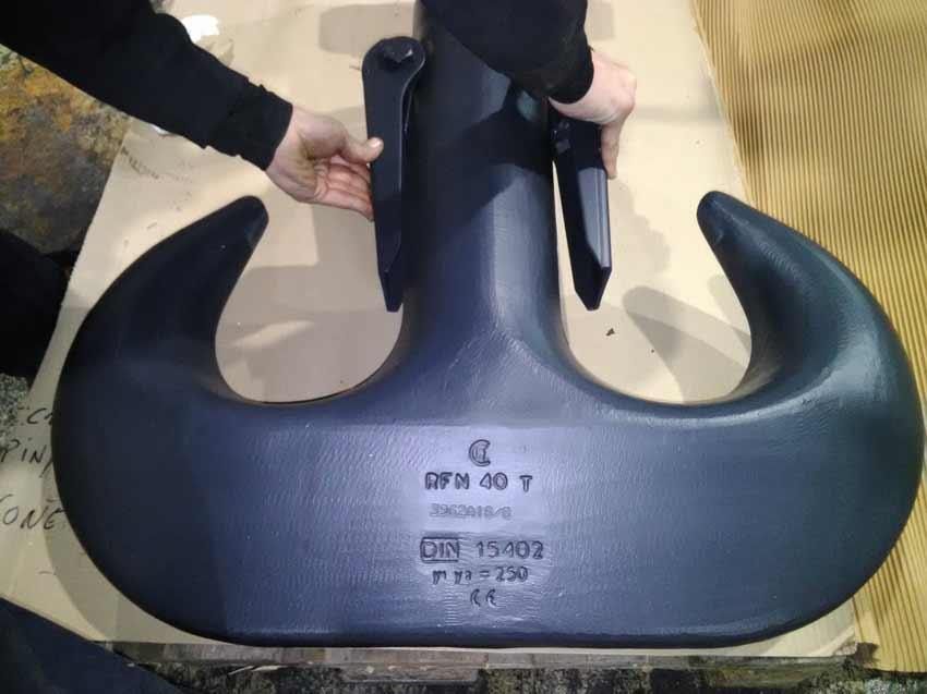 How is a crane hook tested?